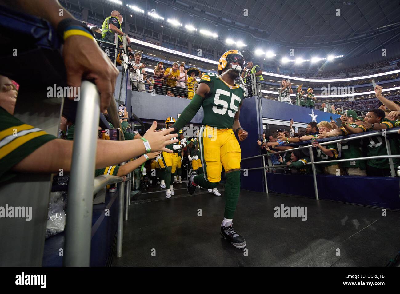 Green Bay Packers defensive end Kingsley Enagbare (55) enters the field ...