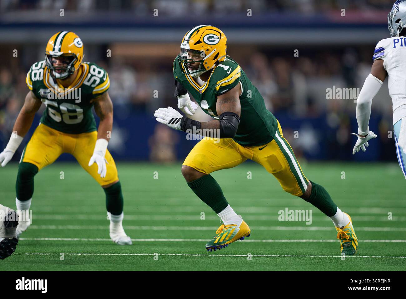 Green Bay Packers defensive end Micah Parsons (1) rushes in on a play ...