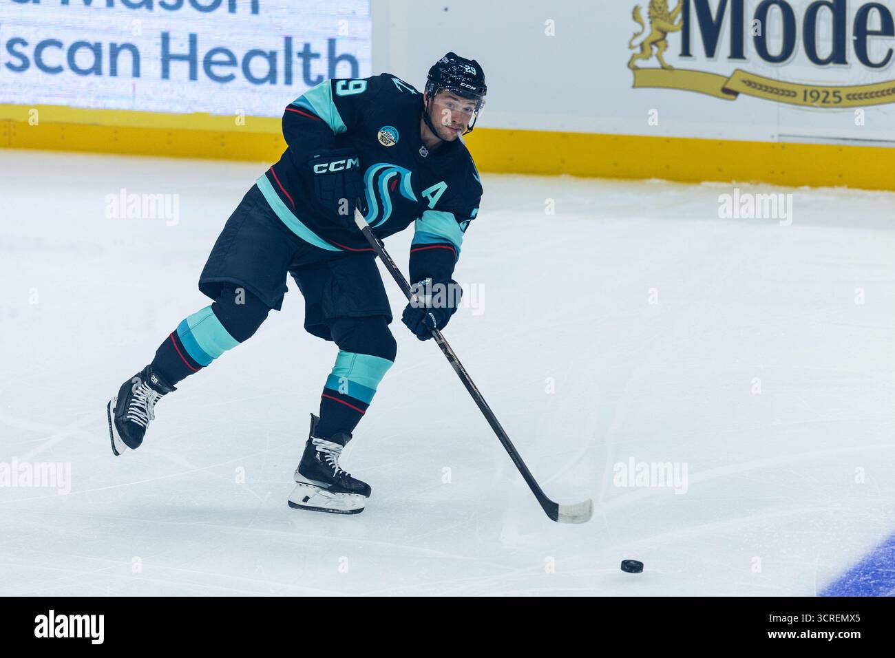 Seattle Kraken defenseman Vince Dunn passes the puck during a pre ...