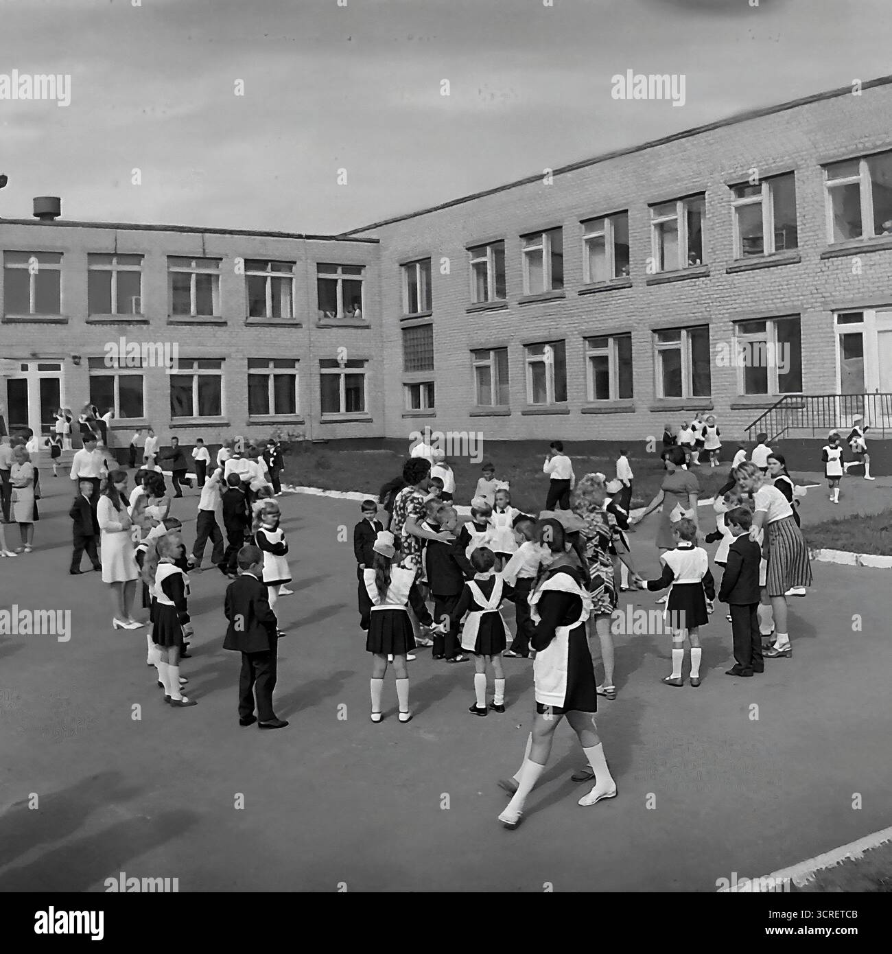 An authentic black and white photograph from the 1980s capturing a ...