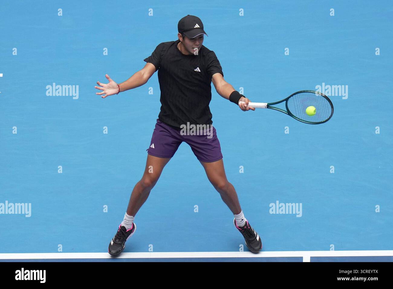 Learner Tien of the United States returns a shot from Jannik Sinner of ...