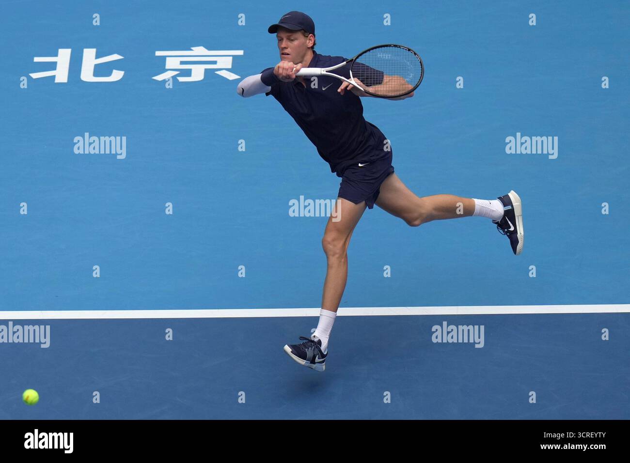 Jannik Sinner of Italy returns a shot from Learner Tien of the United ...