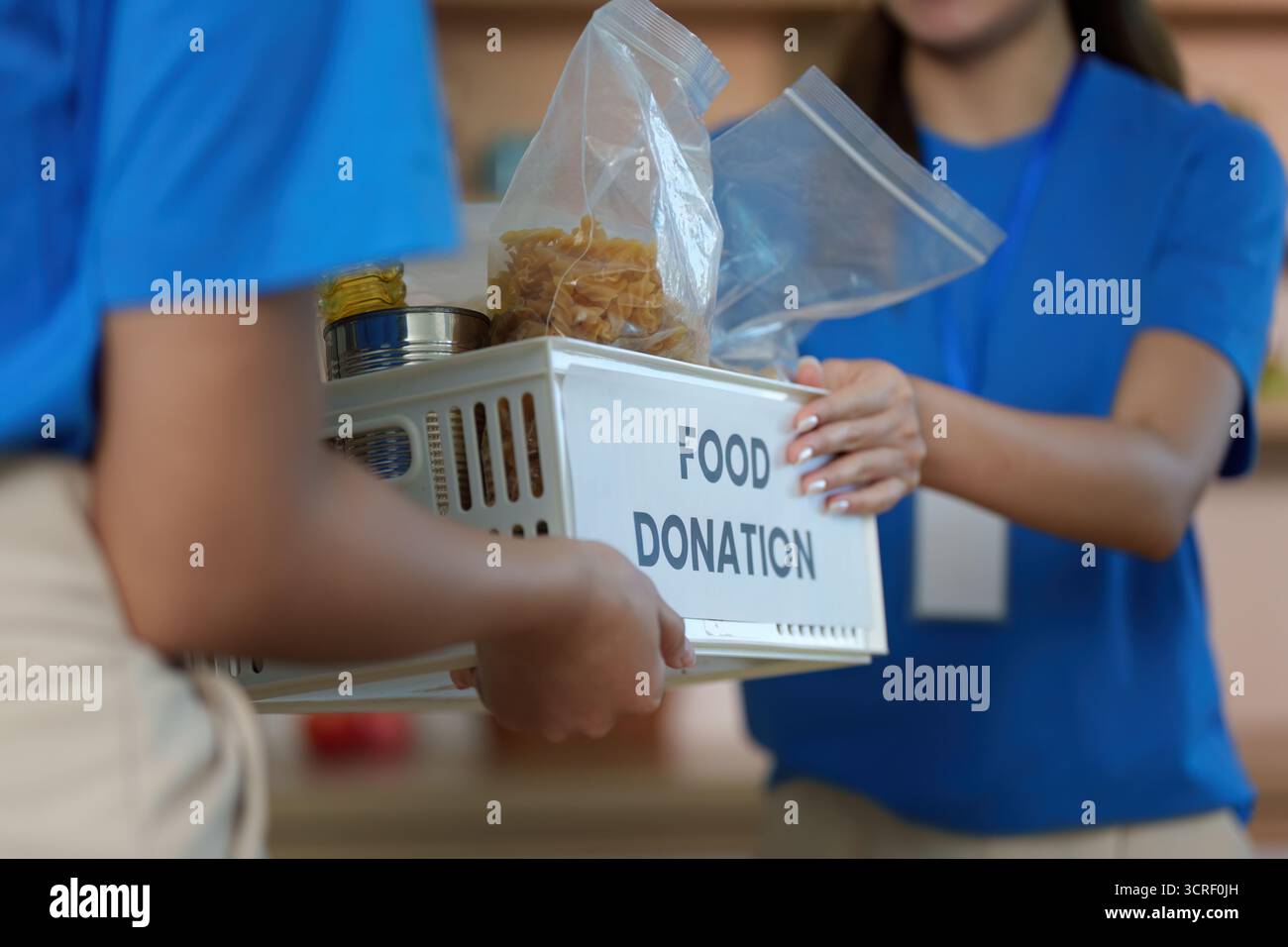 Food donation initiative volunteer hi-res stock photography and images - Alamy