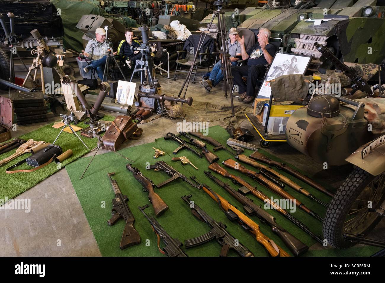A showcase of WWII-era weapons inside the museum. The Tank Museum's ...