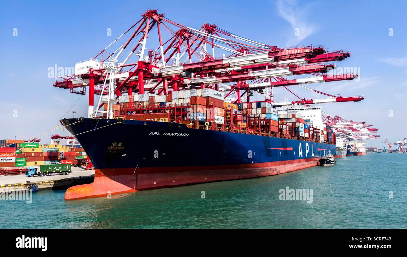 QINGDAO, CHINA - OCTOBER 1, 2025 - The cargo ship is loading and ...