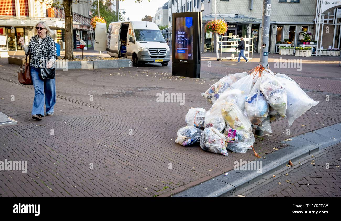 GOUDA - Garbage bags in a residential area with separated waste in ...