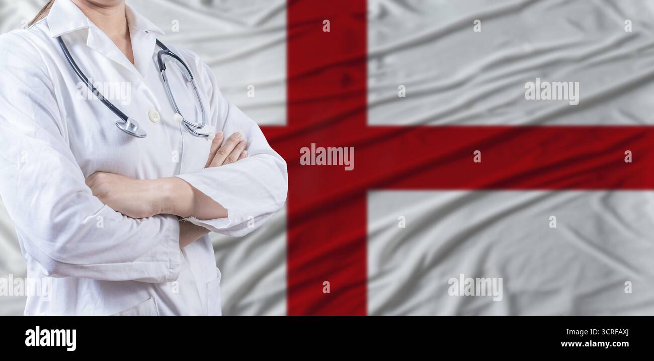 Doctor with crossed arms on England flag. England health and care ...