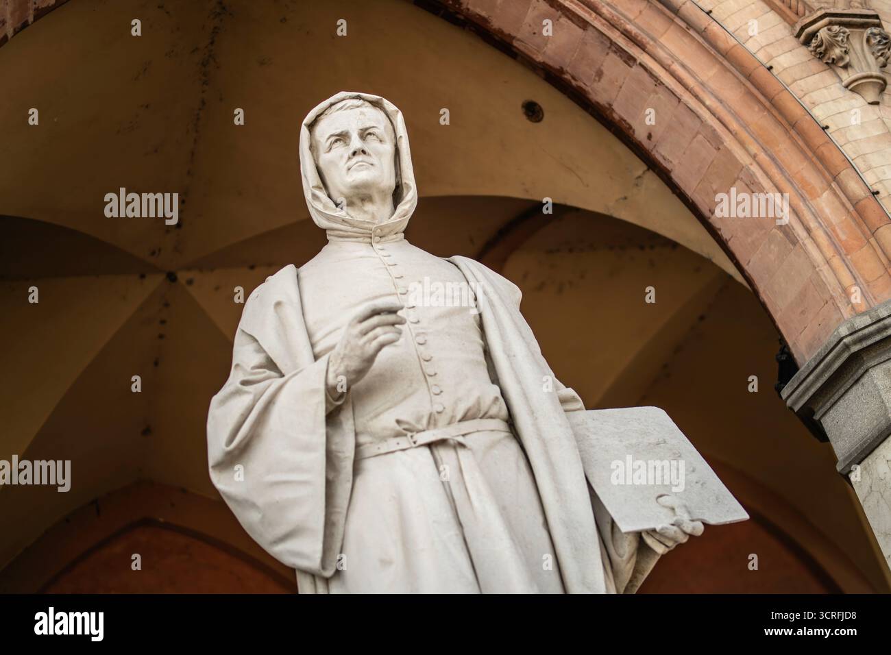Padova, italy 1 october 2025: giotto statue holding a painter’s palette ...