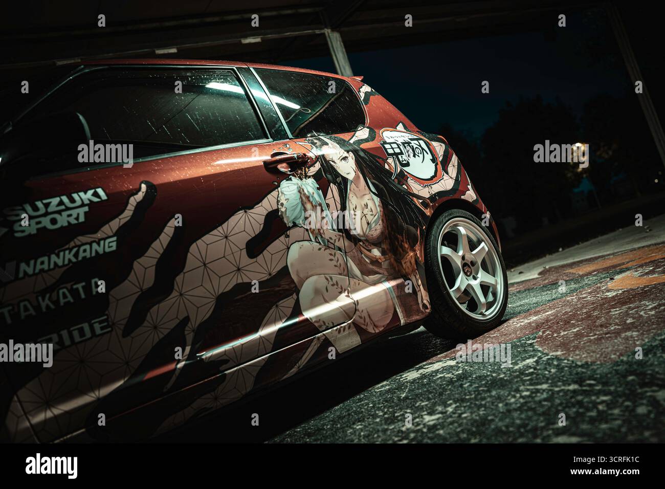 Rome, italy 30 september 2025: custom suzuki swift car showcasing an ...