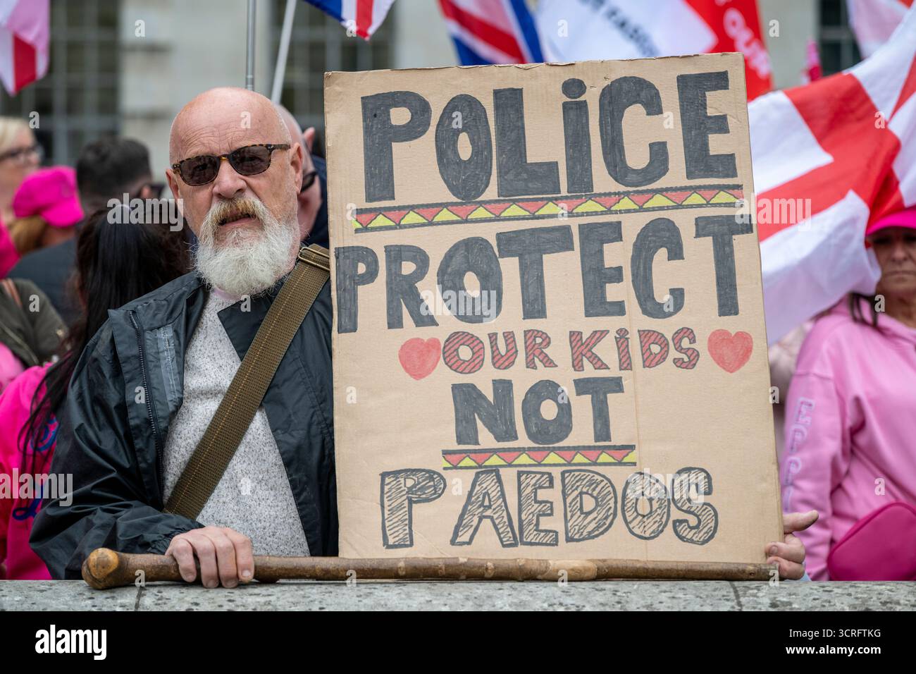 London, UK. 1 October 2025. People take part in a ‘pink protest’ in ...