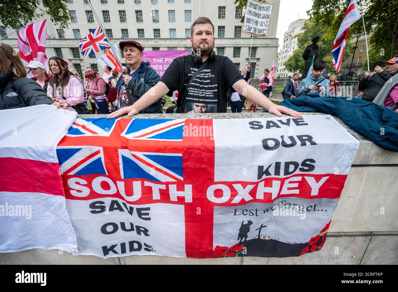 London, UK. 1 October 2025. People take part in a ‘pink protest’ in ...