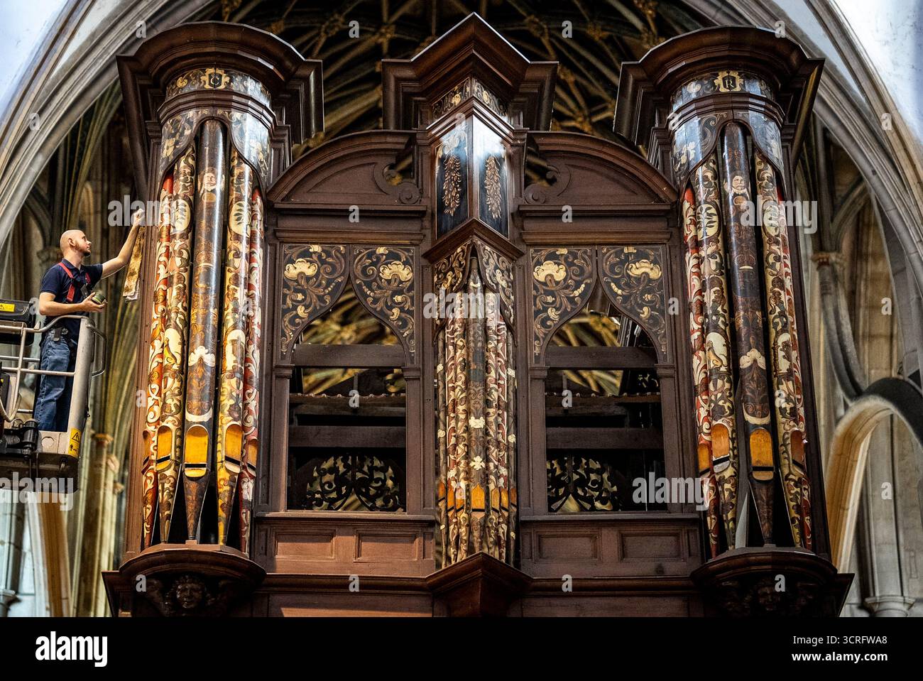 Specialist organ Builder Ed Reade, from Nicholson and Co Ltd, cleans ...
