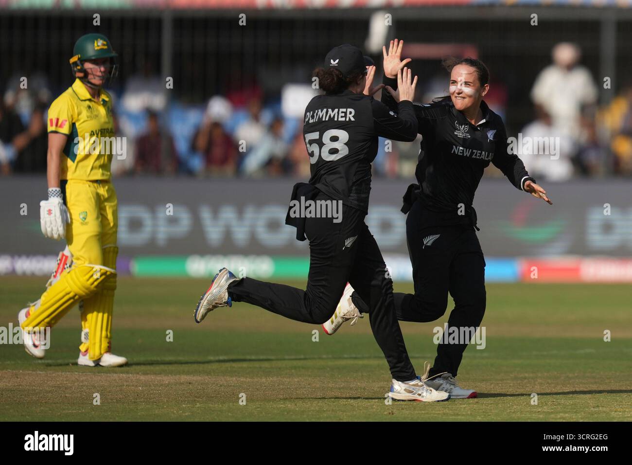 New Zealand's Amelia Kerr , right, celebrates with teammate the wicket ...