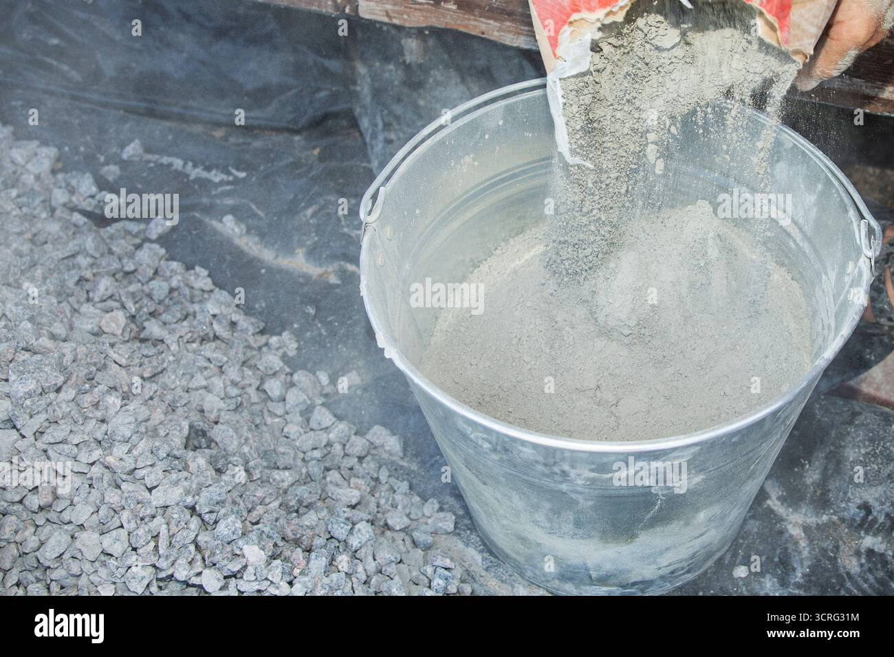 Bucket dry cement powder poured hi-res stock photography and images - Alamy