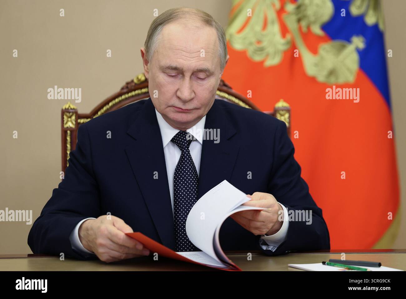 Russian President Vladimir Putin chairs a Security Council meeting via ...