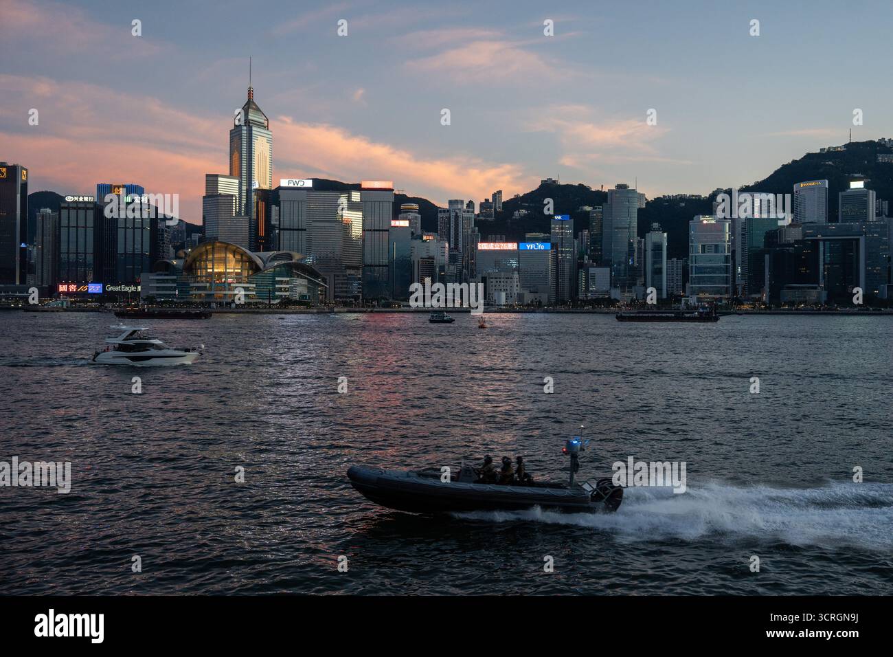 A police speed boat sailing in Victoria Harbor before the China ...