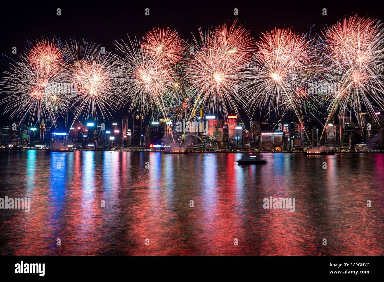Fireworks exploding over Victoria Harbor during the China national day fireworks display on ...