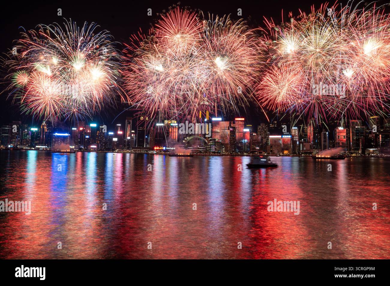 Fireworks exploding over Victoria Harbor during the China national day ...