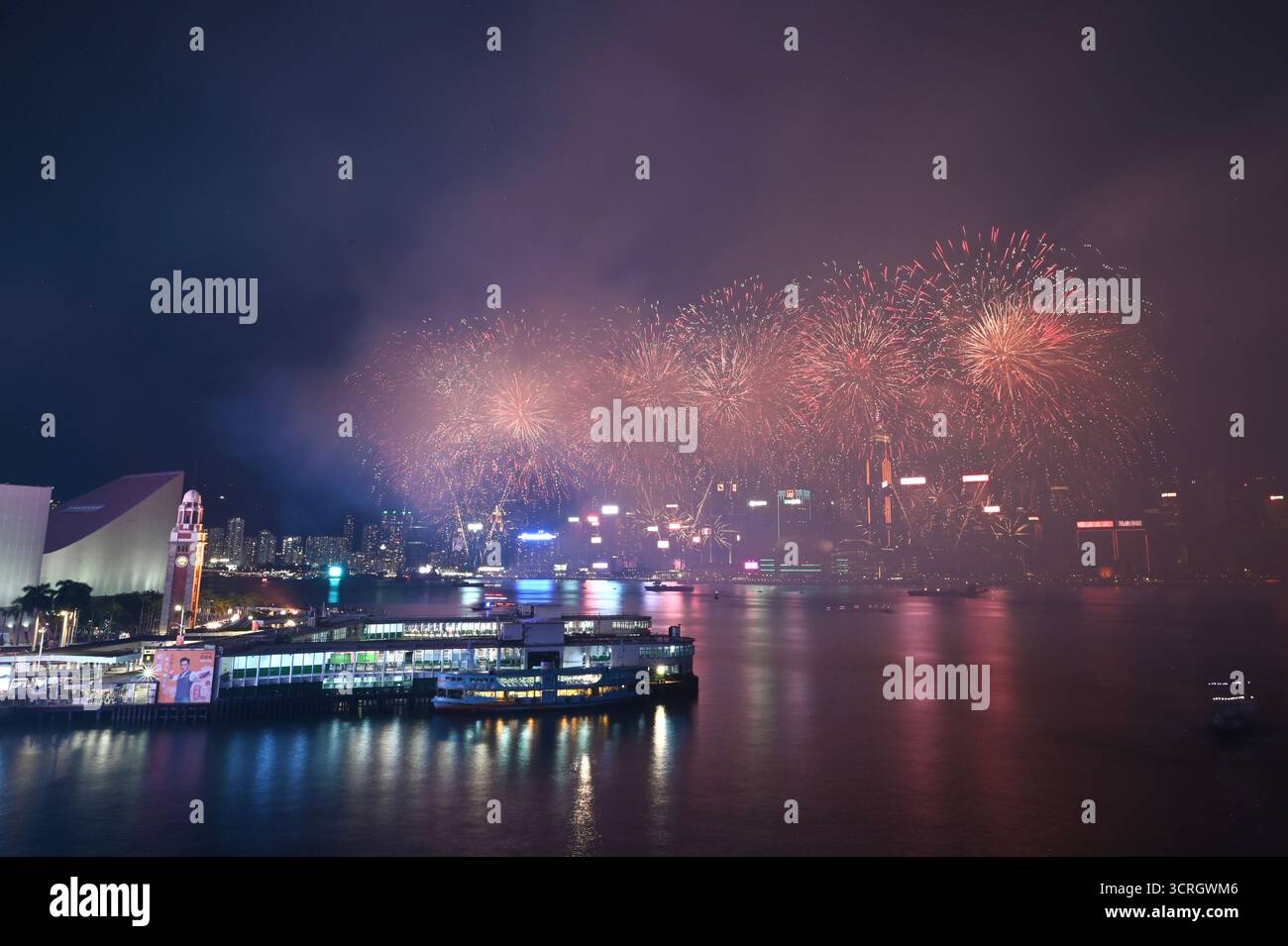 Fireworks exploding over Victoria Harbor during the China national day ...