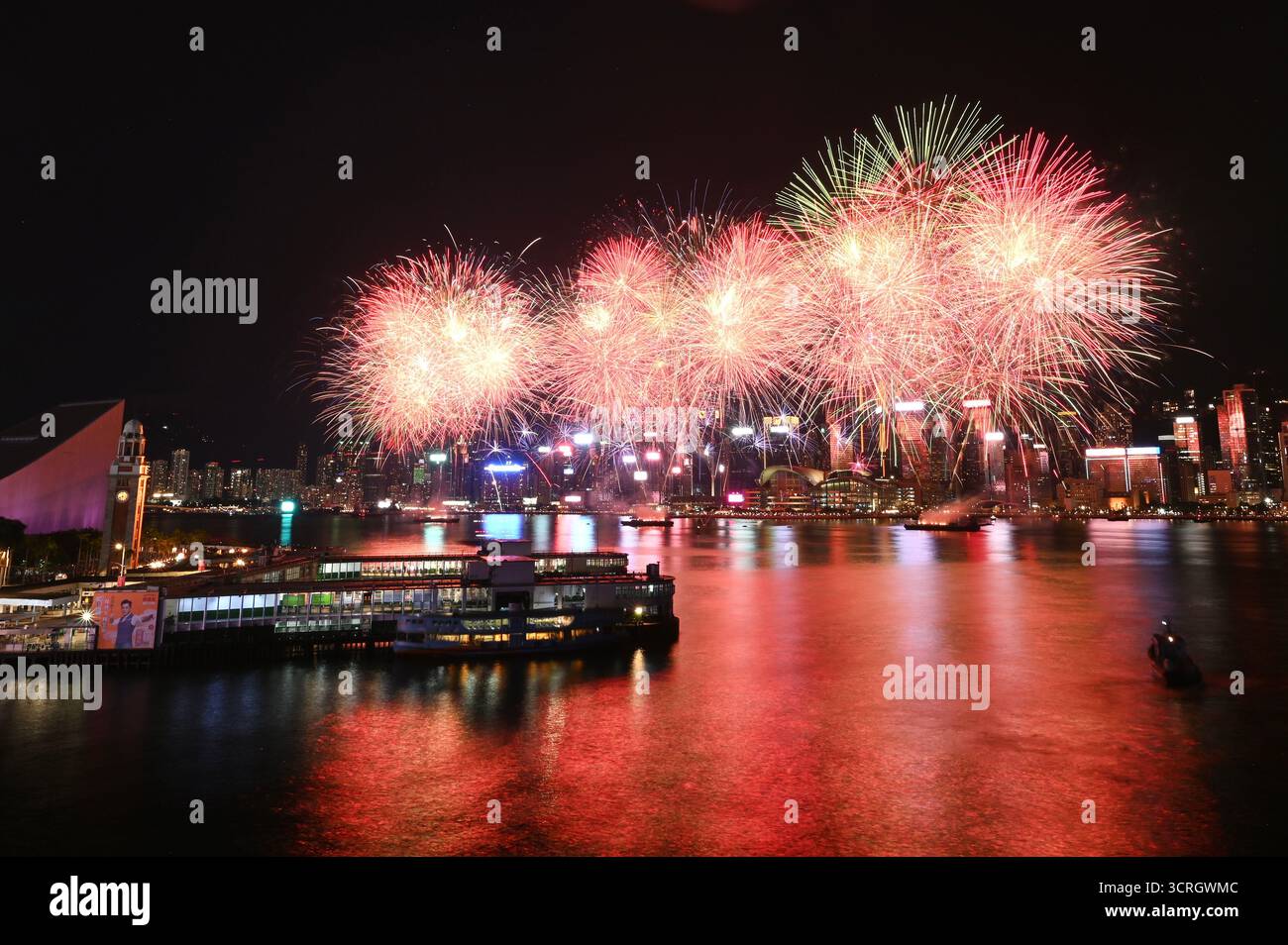 Fireworks exploding over Victoria Harbor during the China national day fireworks display on ...