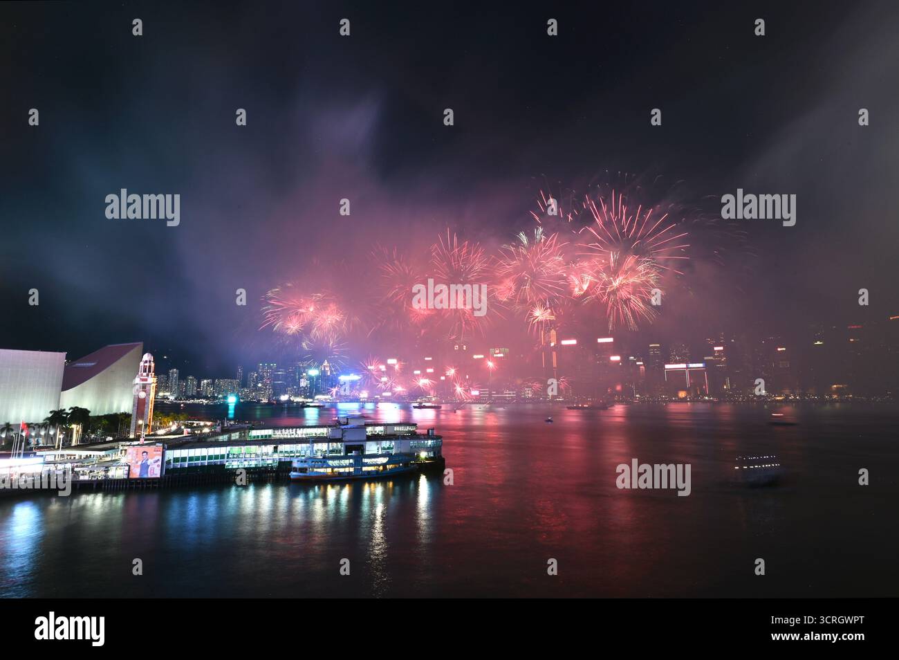 Fireworks exploding over Victoria Harbor during the China national day ...