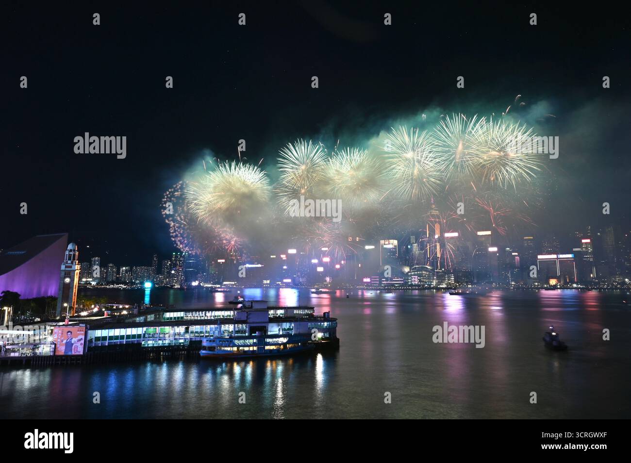 Fireworks exploding over Victoria Harbor during the China national day ...