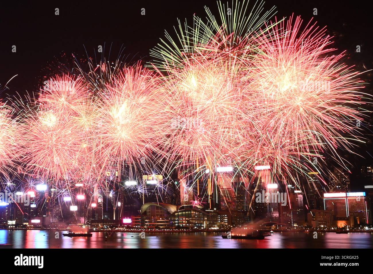 Fireworks exploding over Victoria Harbor during the China national day ...
