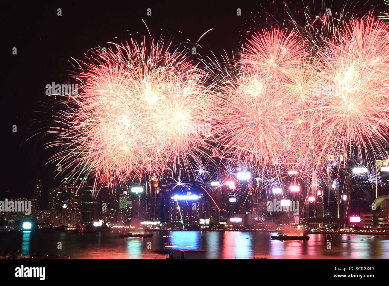 Fireworks exploding over Victoria Harbor during the China national day ...