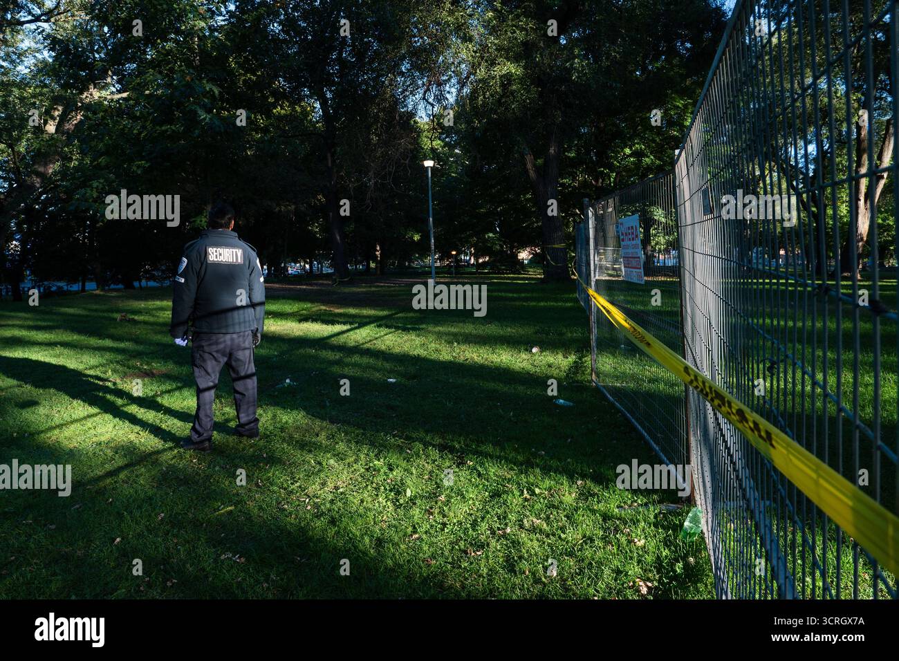 Security guards watch over Dufferin Grove Park in Toronto, on Wednesday, October 1, 2025. THE ...