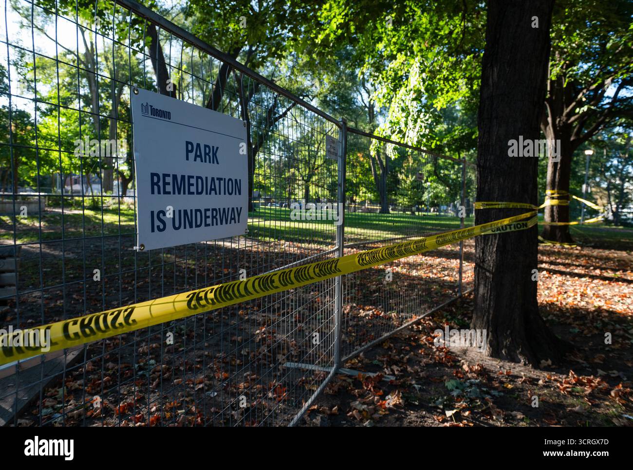 Security guards watch over Dufferin Grove Park in Toronto, on Wednesday ...