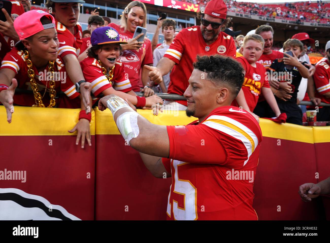 Kansas City Chiefs quarterback Patrick Mahomes greets fans as he leaves ...