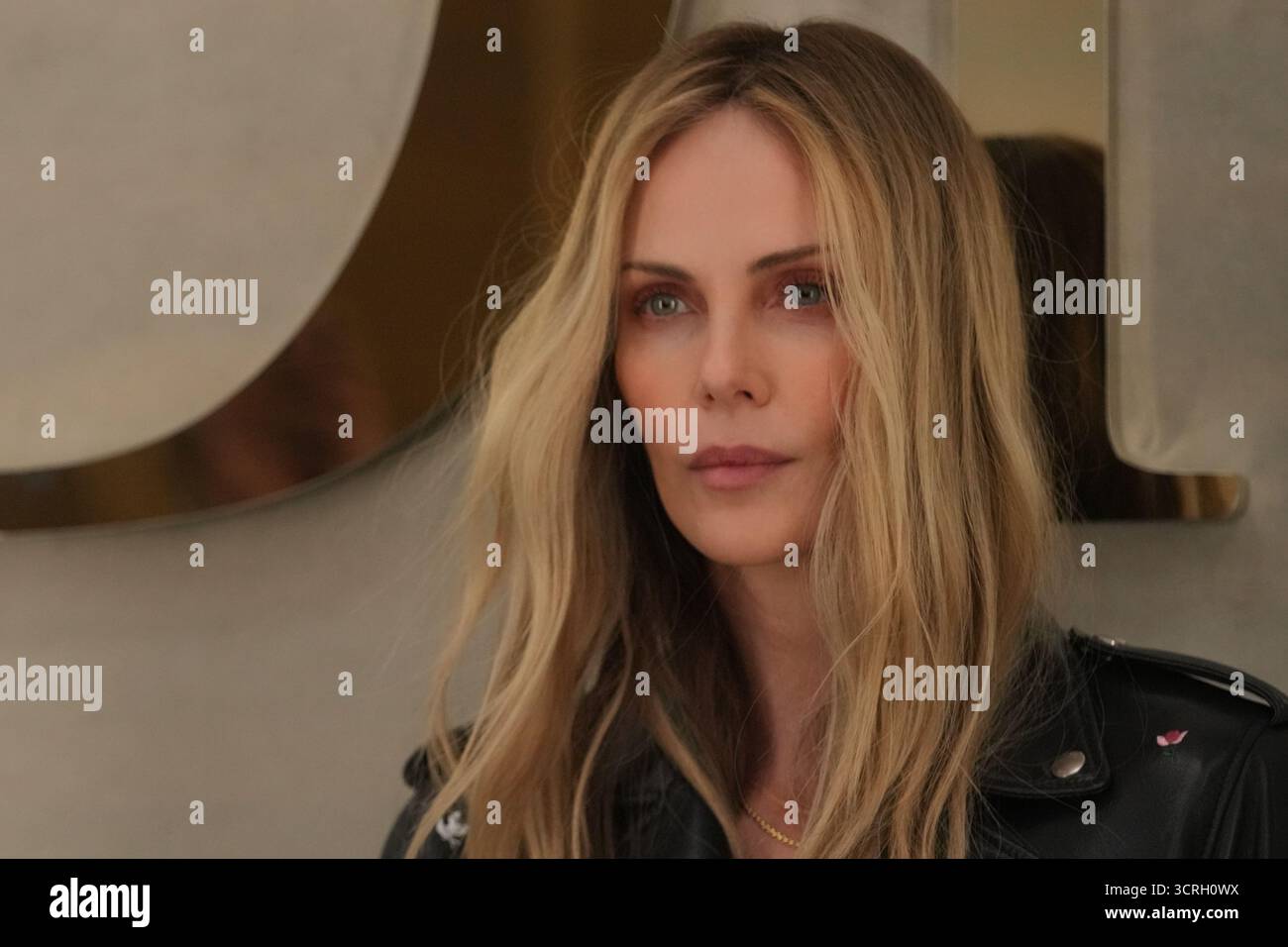 Charlize Theron poses before the Dior Spring/Summer 2026 collection ...