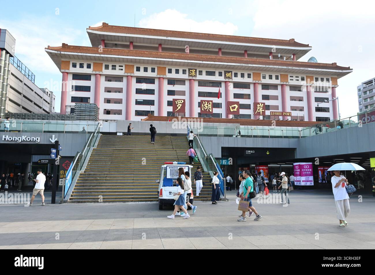 People walking pass the Luohu Port on October 1, 2025 in Shenzhen ...