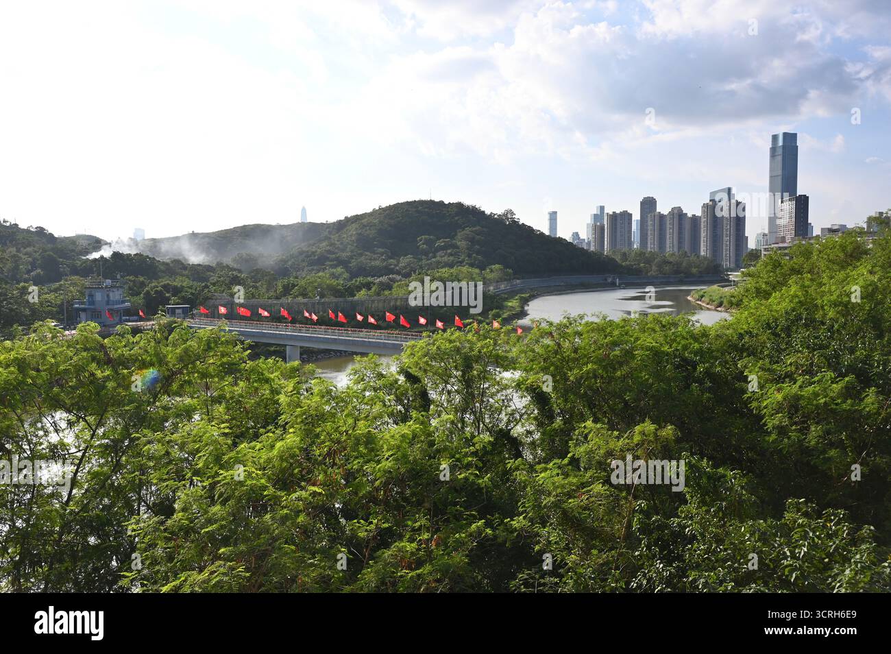 People walking pass the Luohu Port on October 1, 2025 in Shenzhen ...
