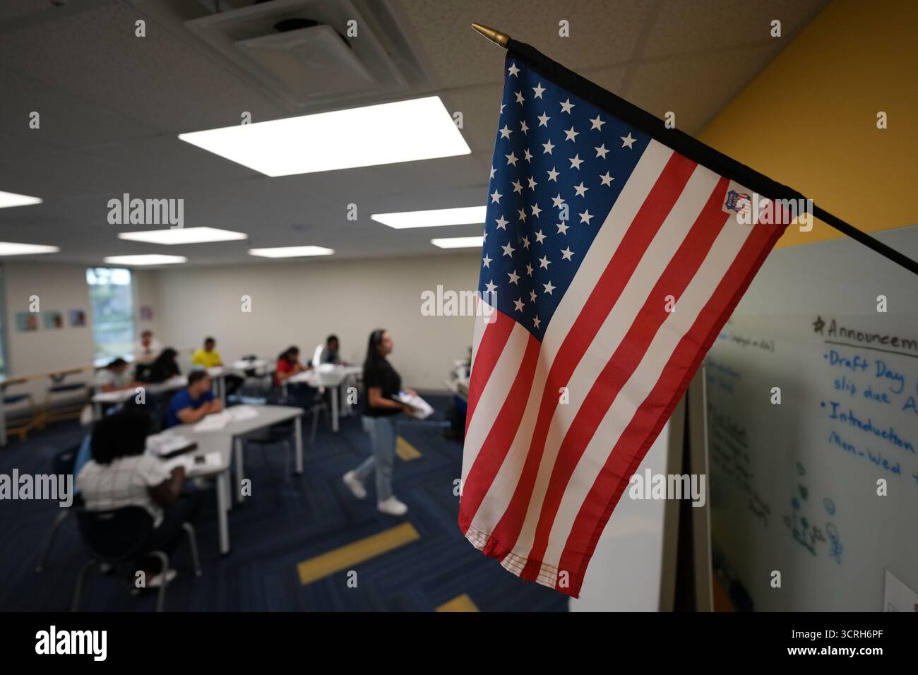 Immigrants trying to learn the English language participate in ESOL ...