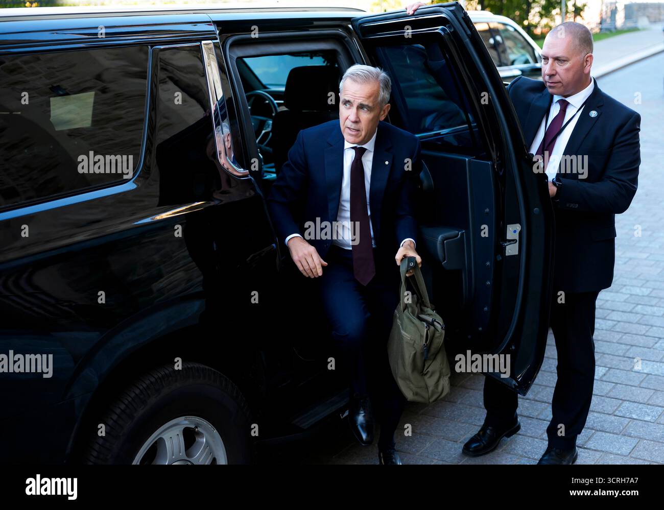 Prime Minister Mark Carney arrives on Parliament Hill in Ottawa before ...