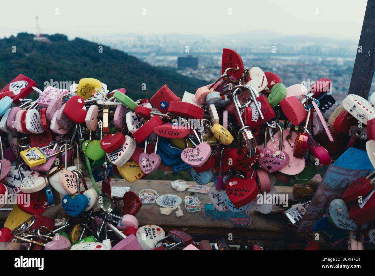 Colorful love locks on the fence at N Seoul Tower, a famous romantic ...