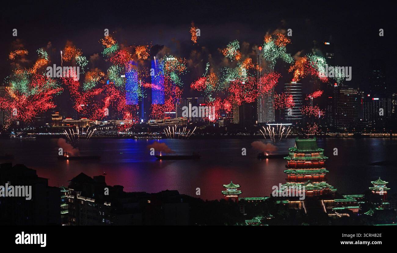 (251001) -- NANCHANG, Oct. 1, 2025 (Xinhua) -- Fireworks celebrating ...