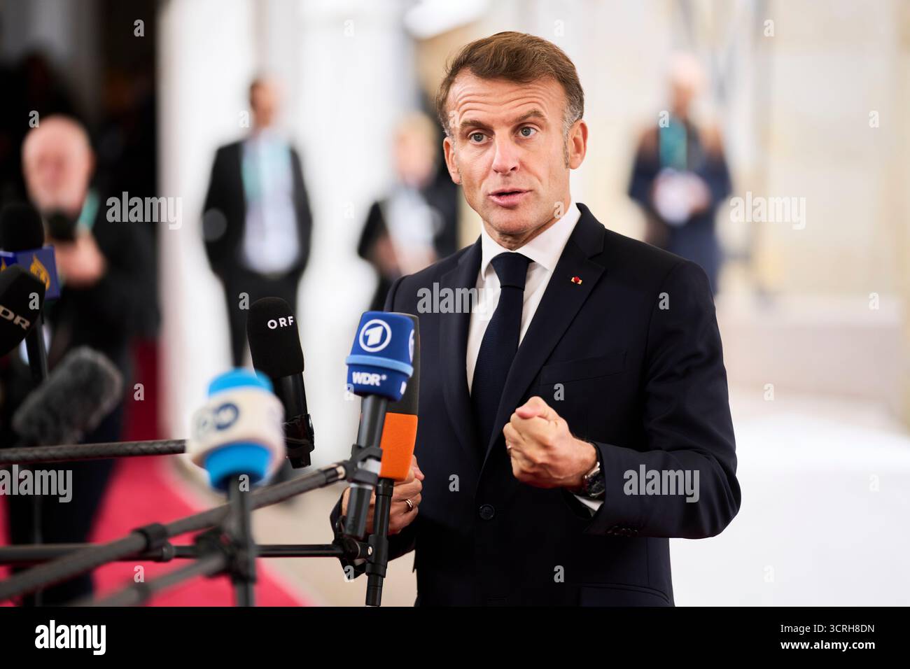 French President Emmanuel Macron arrives at an informal summit in the ...