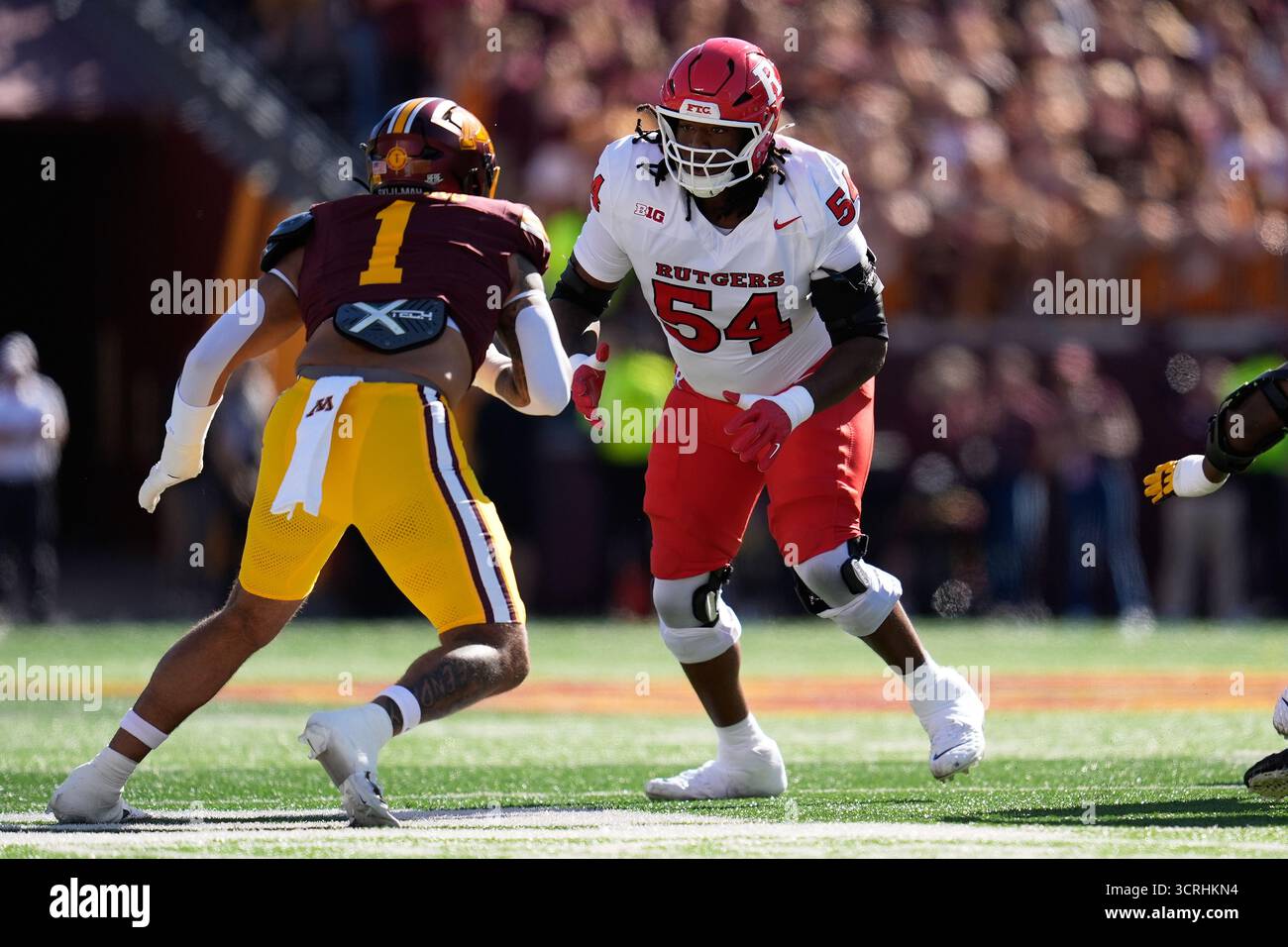 Rutgers offensive lineman Taj White (54) blocks against Minnesota ...