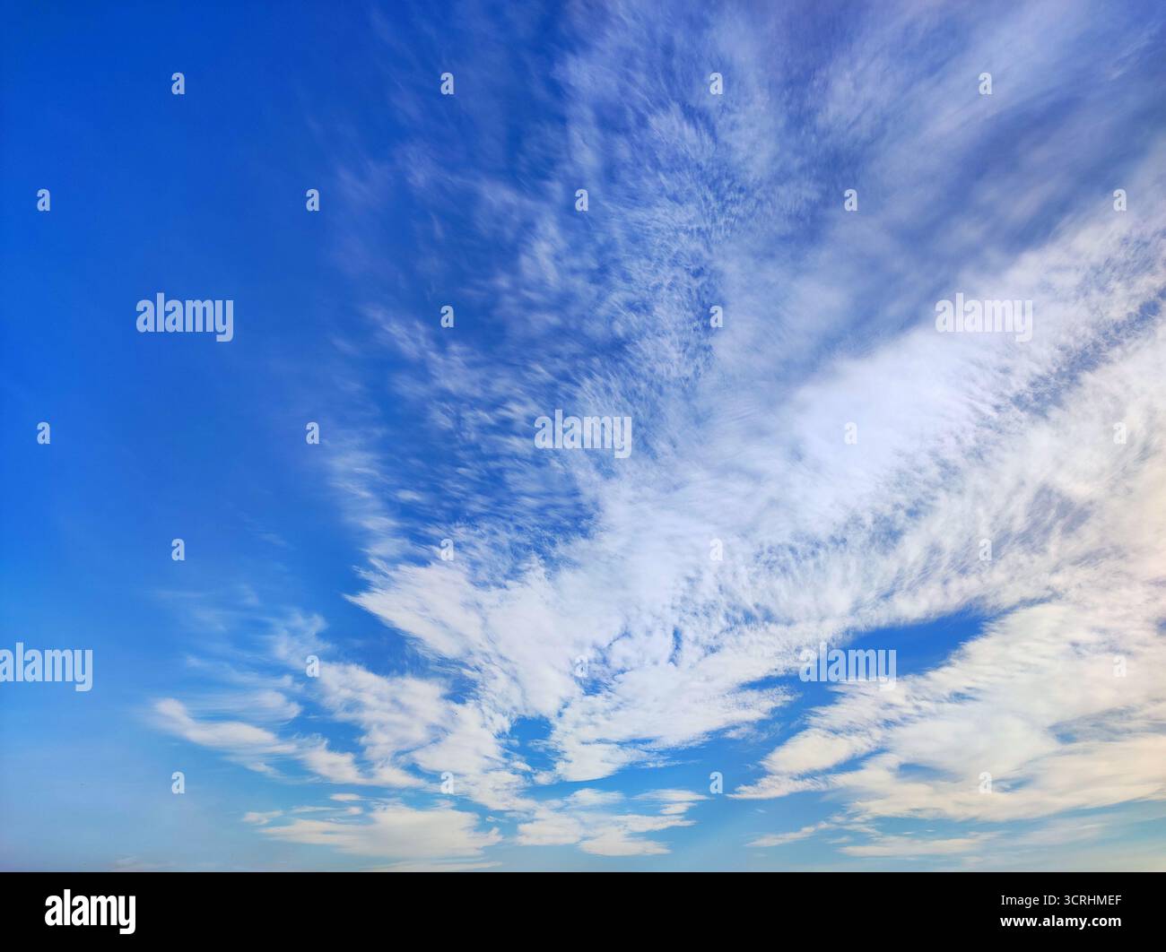 Bright blue sky with fluffy white clouds. Natural background with soft ...