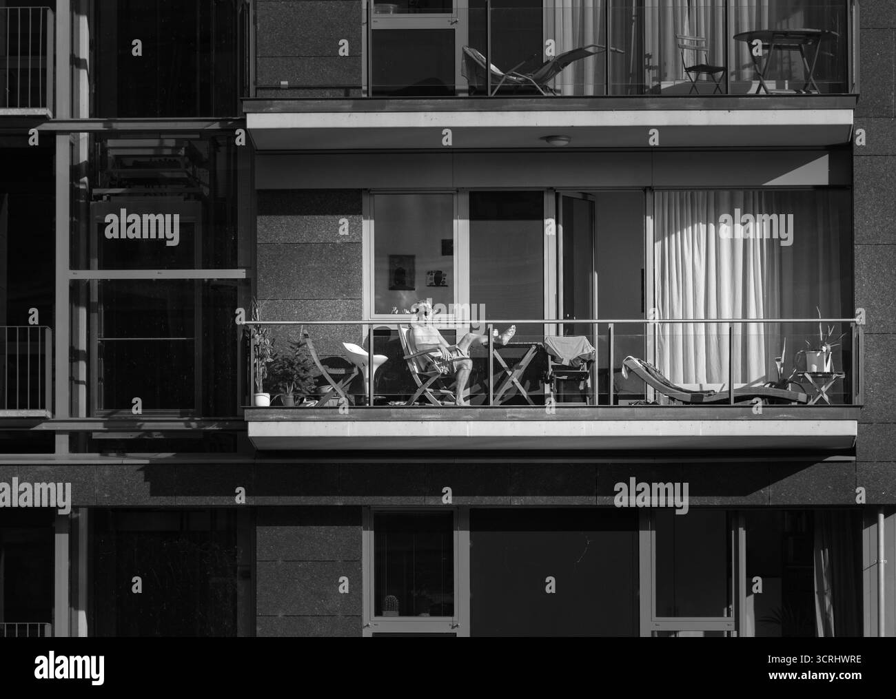 Modern life man in Black and White Stock Photos & Images - Alamy