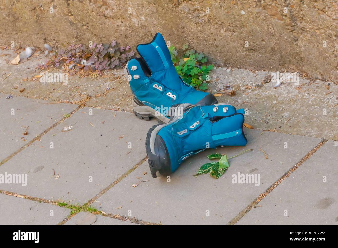 Lost boots sidewalk hi-res stock photography and images - Alamy