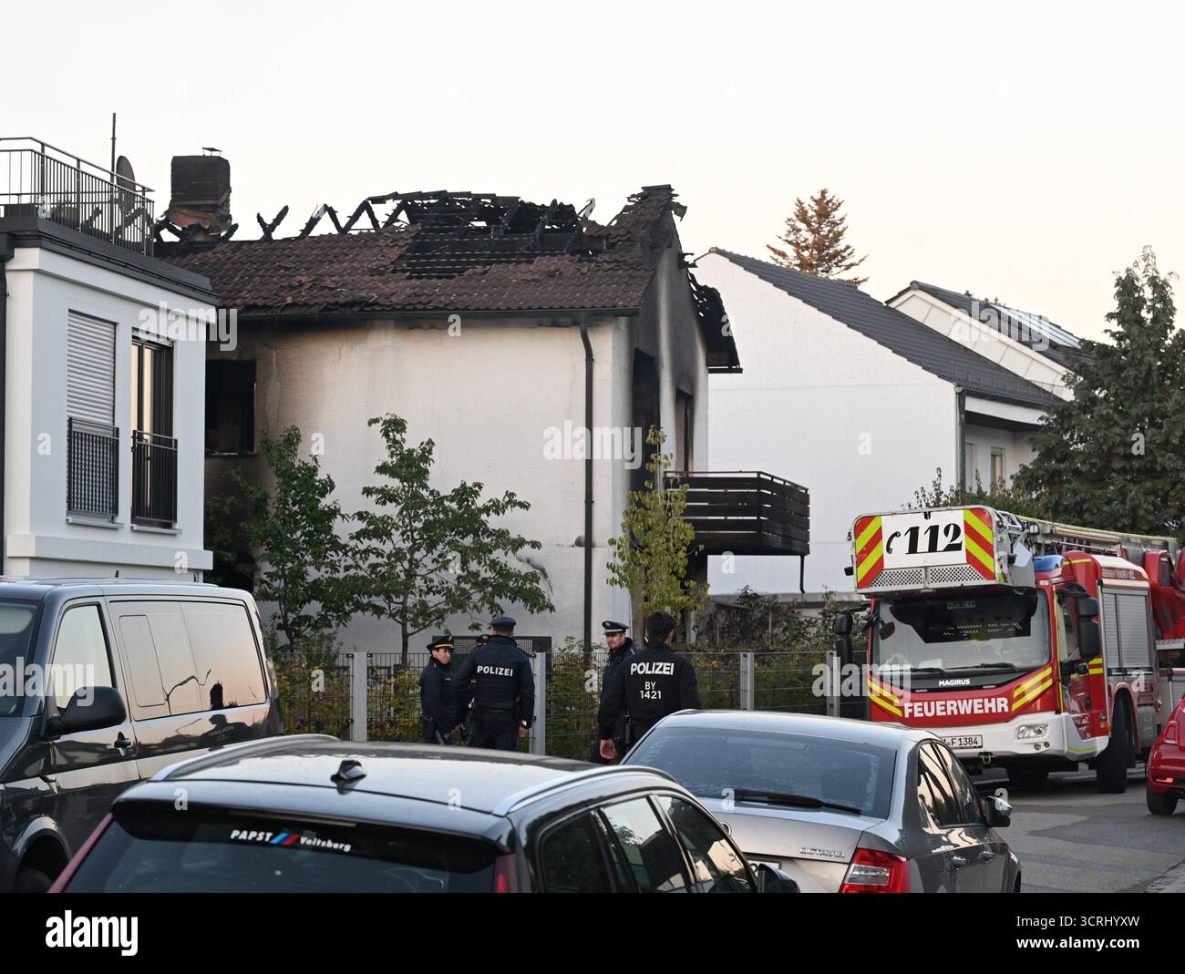 Munich, Germany. 01st Oct, 2025. Firefighters and police stand in front ...