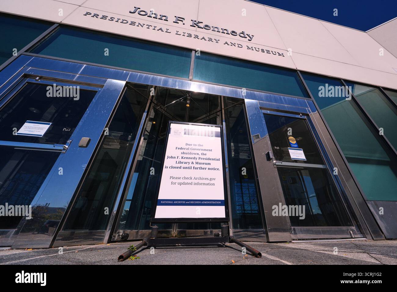 A sign notifies visitors that the John F. Kennedy Presidential Library ...
