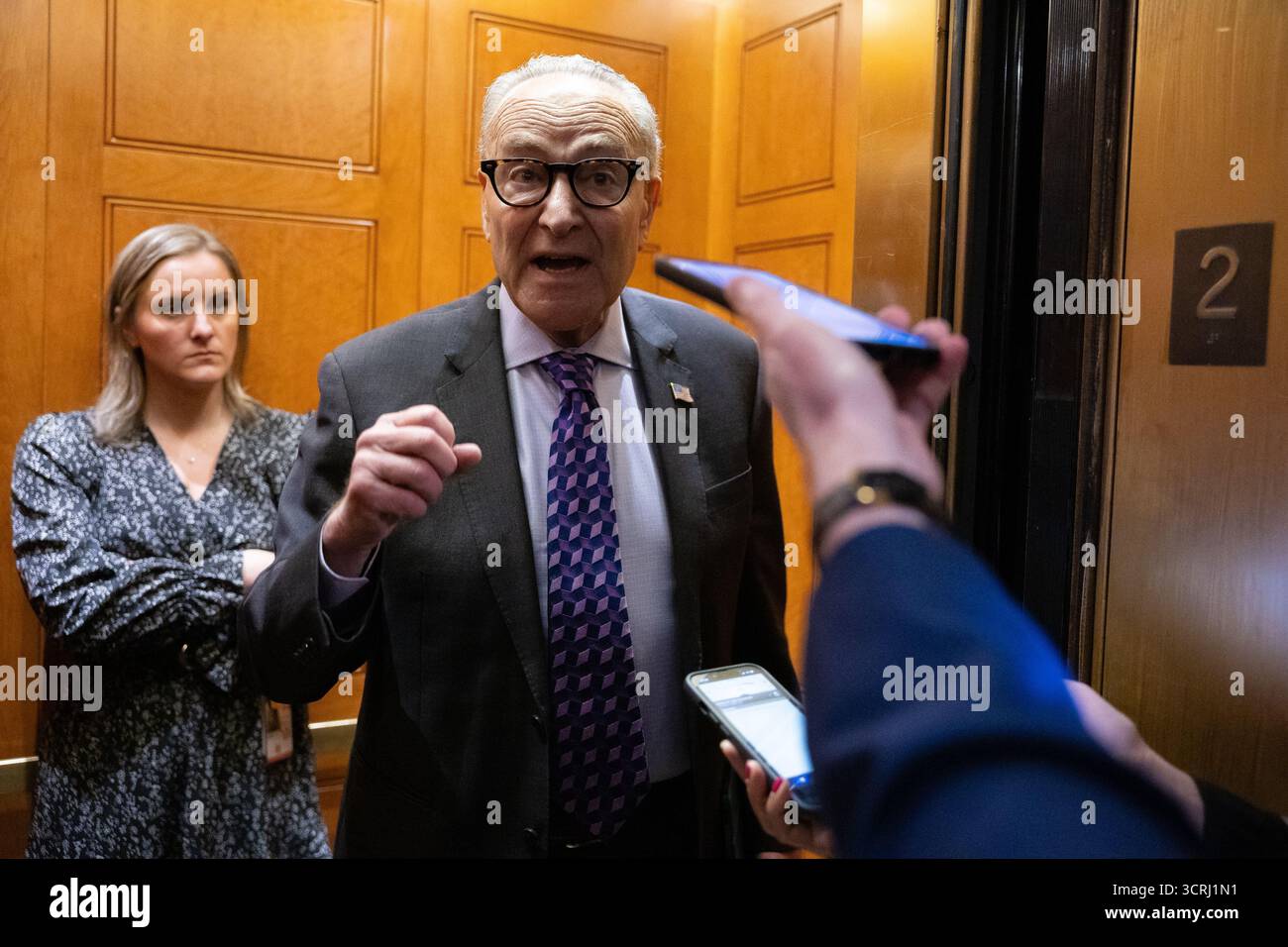 Senate Minority Leader Chuck Schumer (D-N.Y.) speaks with reporters at ...