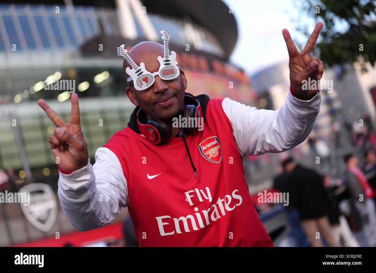An Arsenal fan outside the stadium before the UEFA Champions League at ...