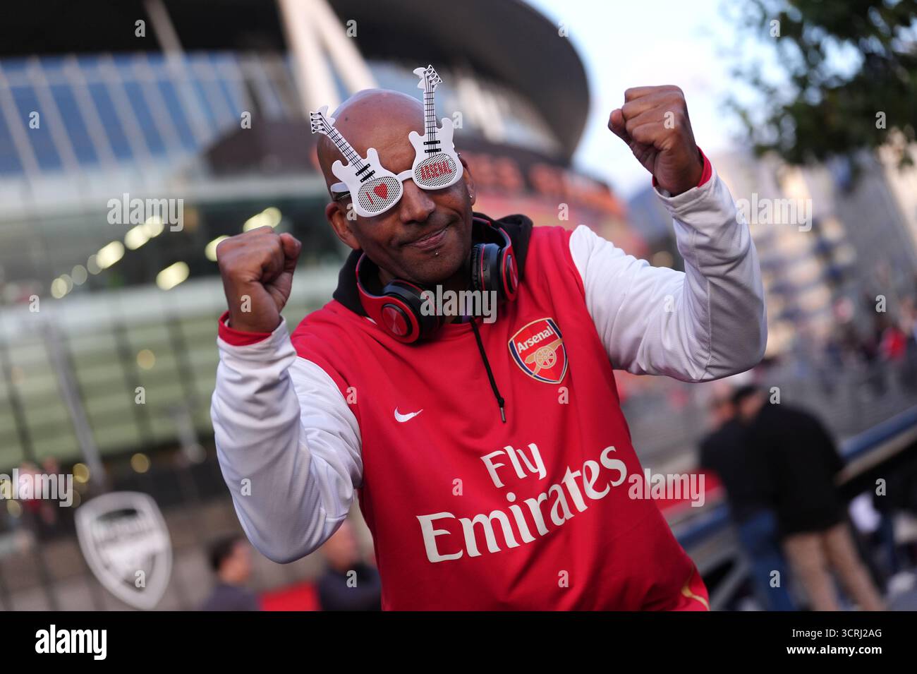 An Arsenal fan outside the stadium before the UEFA Champions League at ...