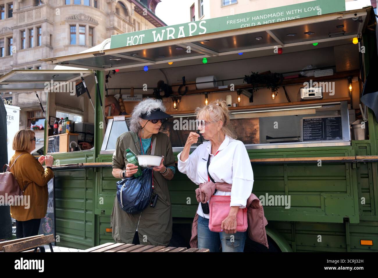 Basel in northwestern Switzerland. Market square street food dining ...