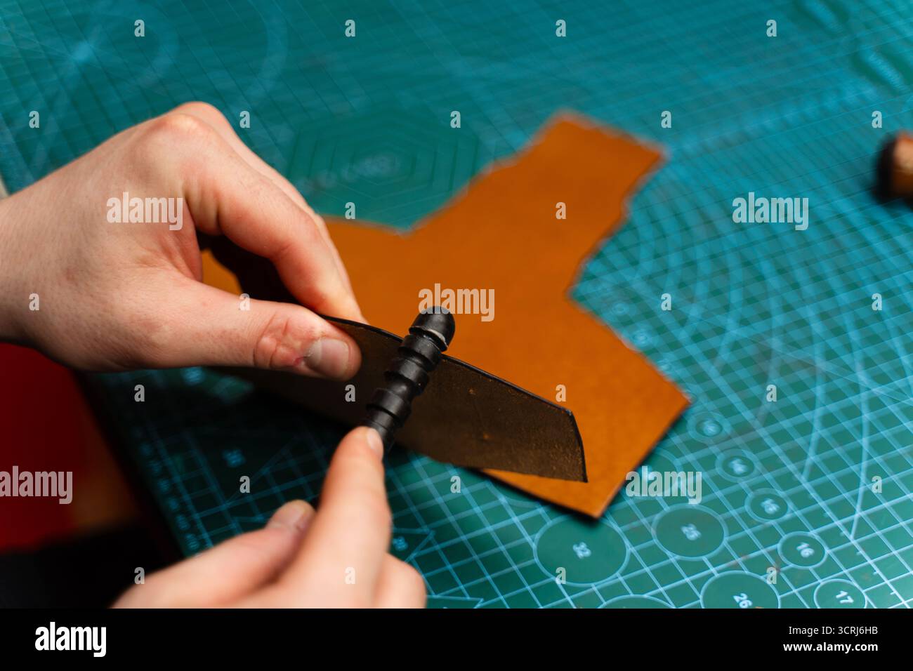 Leather burnishing creates polished edges hi-res stock photography and ...
